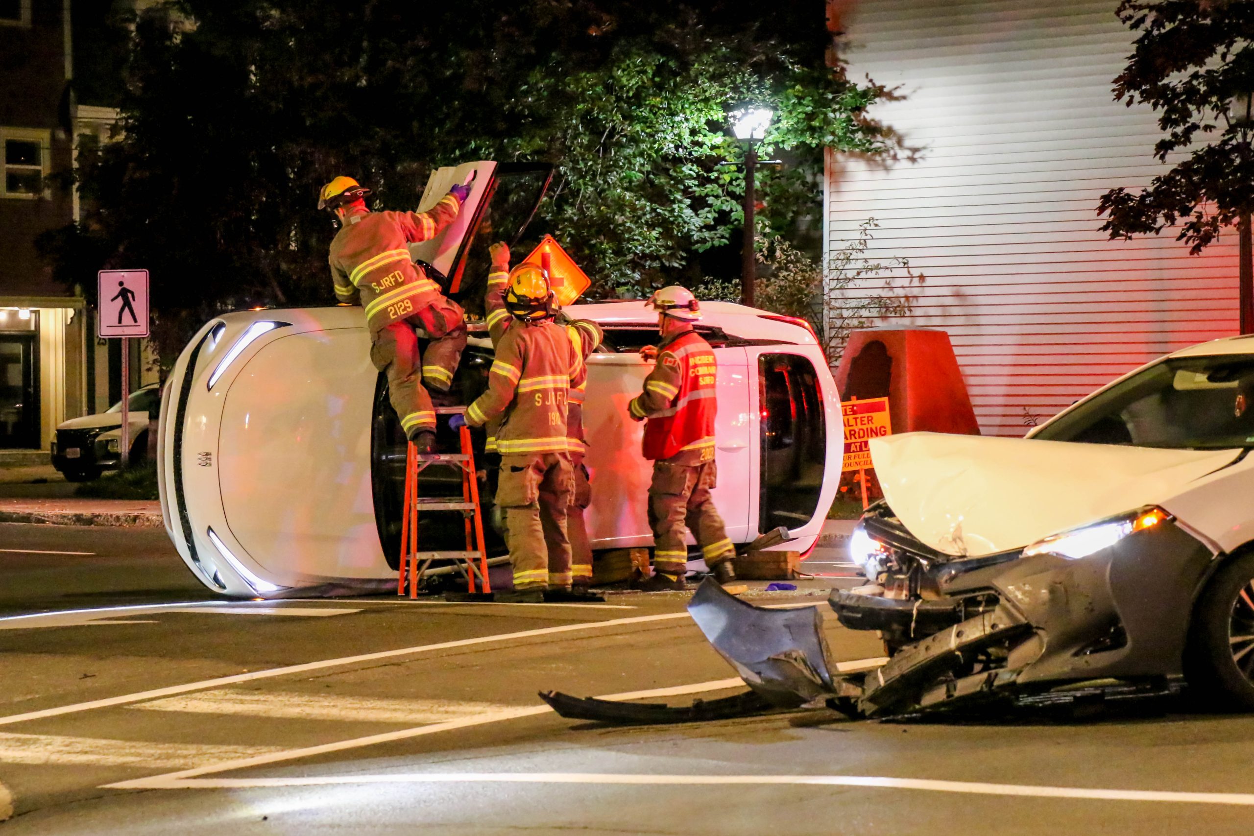 Vehicle rolls onto its side in late-night collision, no serious ...