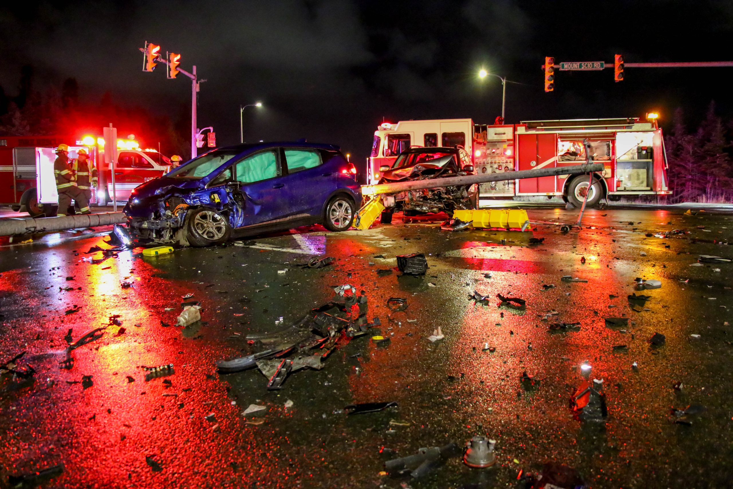 Dramatic collision knocks down light pole, closes east-end intersection ...